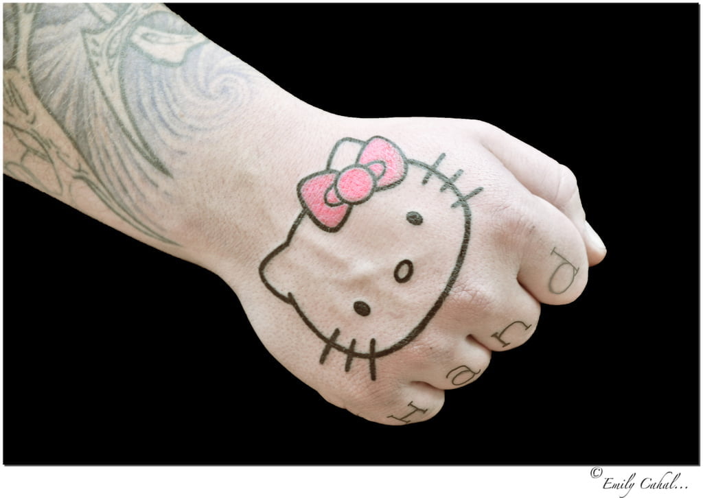 35 Cute And Crazy Hello Kitty Tattoo Design Entertainmentmesh