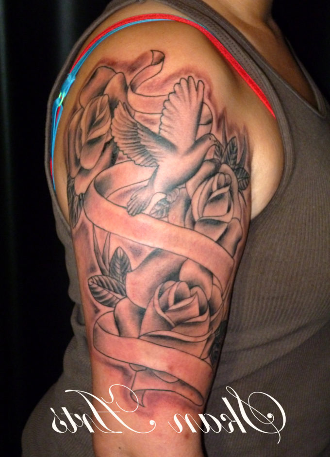 flying dove with roses and ribbon tattoo on sleeve – EntertainmentMesh